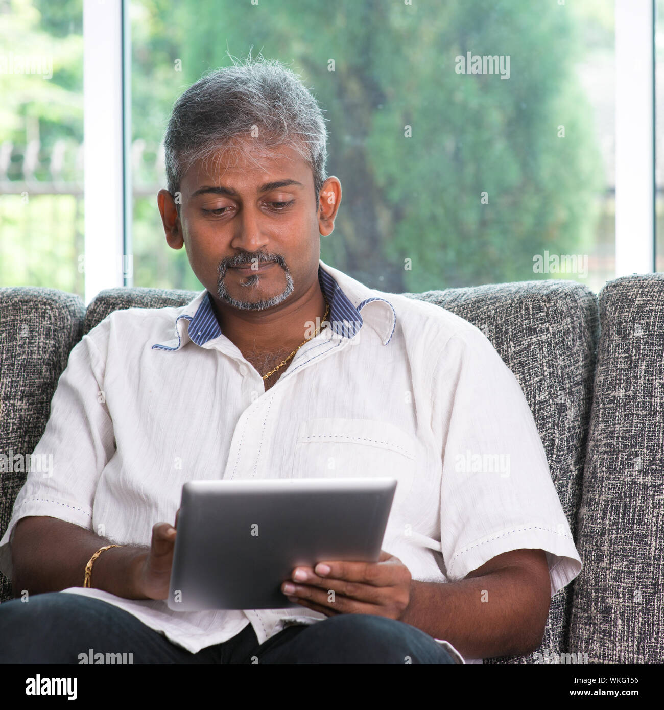 Indian asian old man using computer hi-res stock photography and images ...