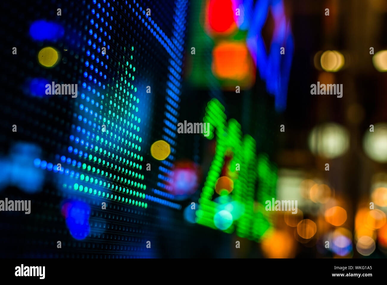 Hong Kong stock market price display at street in the night Stock Photo ...