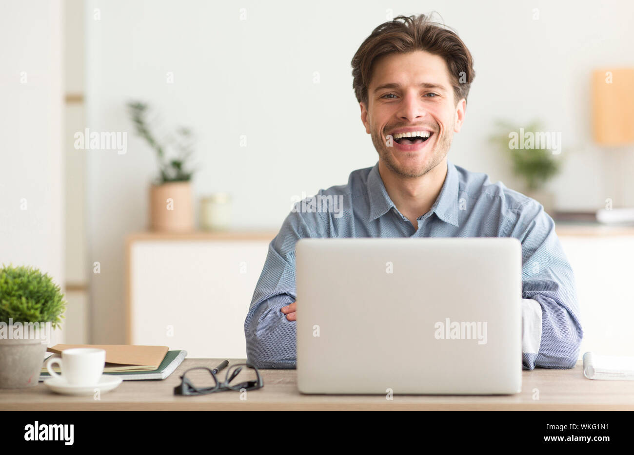 Business man laughing looking camera hi-res stock photography and ...