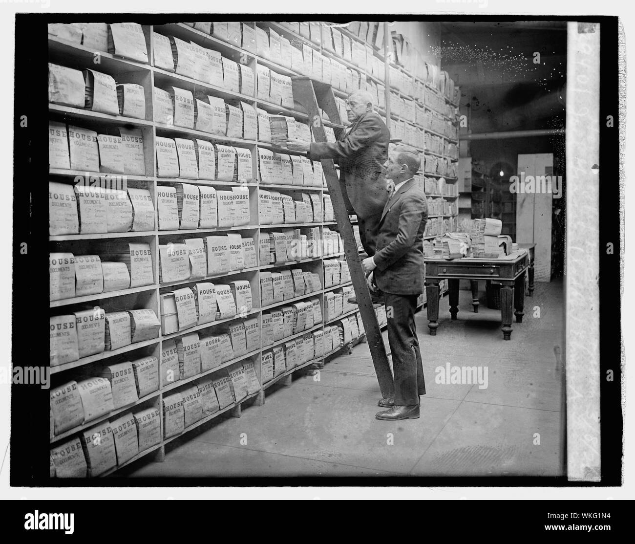 Joel Grayson (ladder), Elmer A. Lewis, House of Rep. document room, 3/8 ...