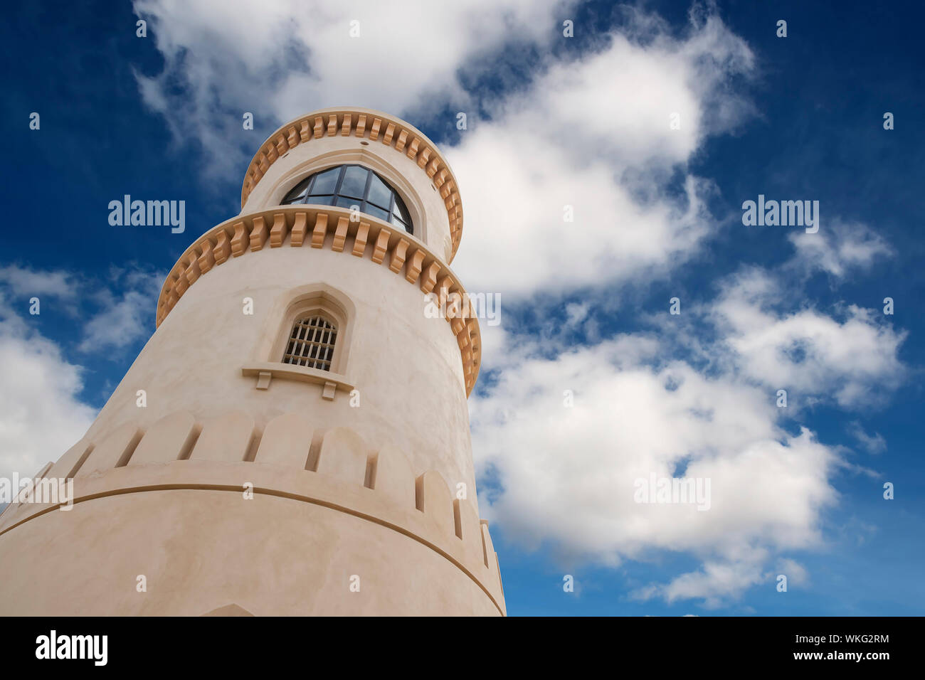 Lighthouse in Sur, Oman with blue sky and white clouds Stock Photo - Alamy