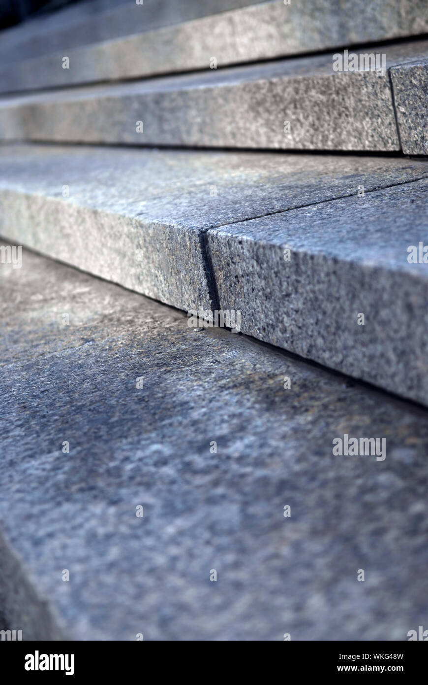 Stairway with granite stone steps in perspective close up Stock Photo ...