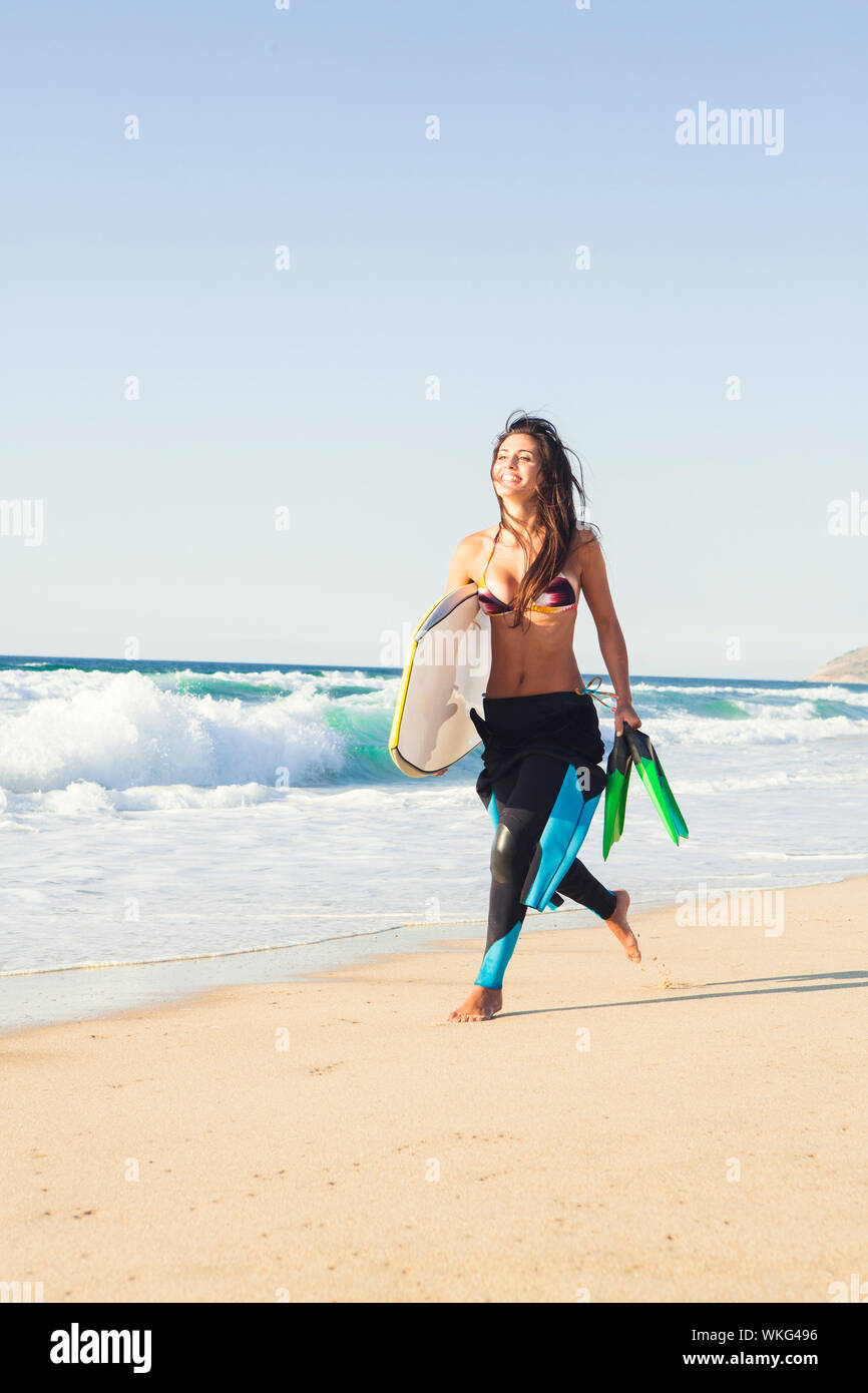 Young Female Bodyboarding High Resolution Stock Photography and Images ...