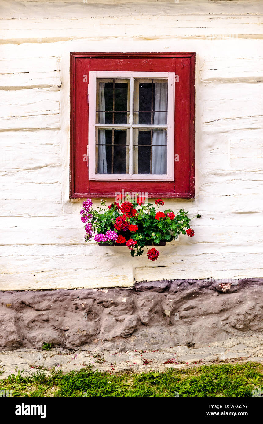 Detail of colorful window on old traditional house, Vlkolinec village ...