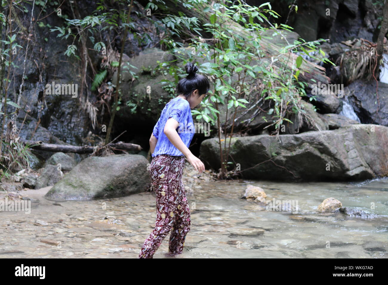 Asian walking river hi-res stock photography and images - Alamy