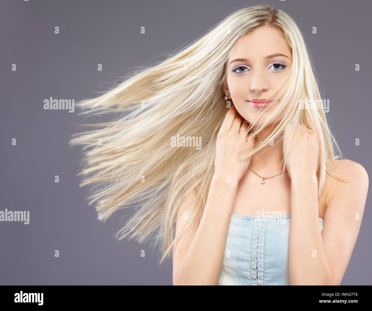 Portrait Of Beautiful Slavonic Blonde Girl With Fluttering Hair Stock