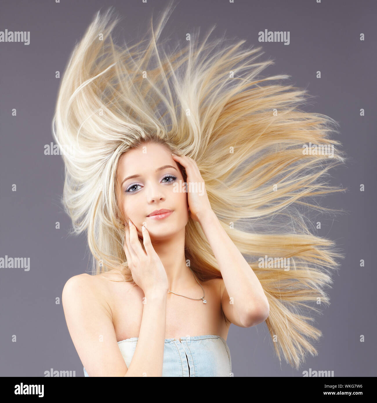 Portrait Of Beautiful Slavonic Blonde Girl With Fluttering Hair Stock