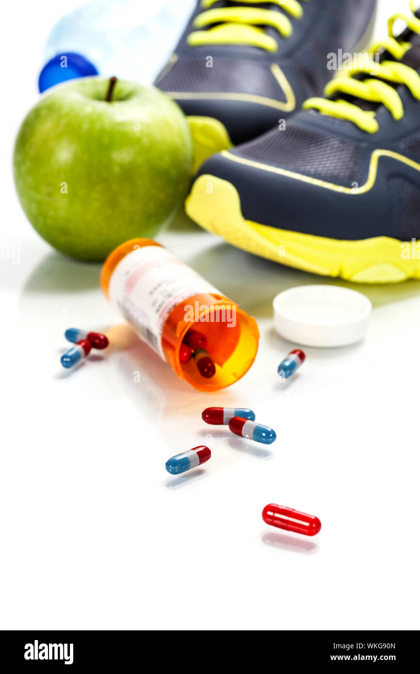 Different tools for sport and pills (Vitamins or Fitness Supplement) on ...
