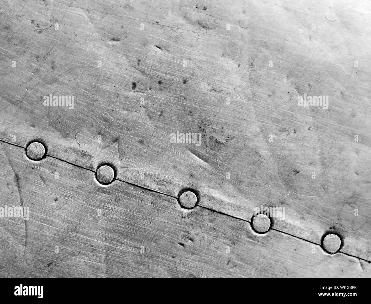 Image of metal plate with five rivets Stock Photo - Alamy