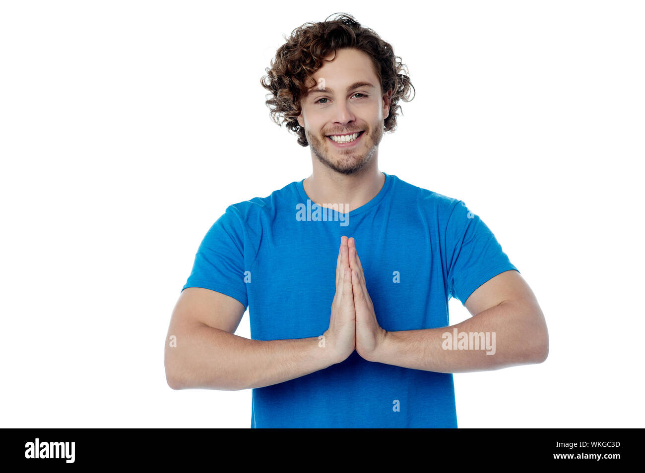 Casual man with typical welcome gesture Stock Photo - Alamy