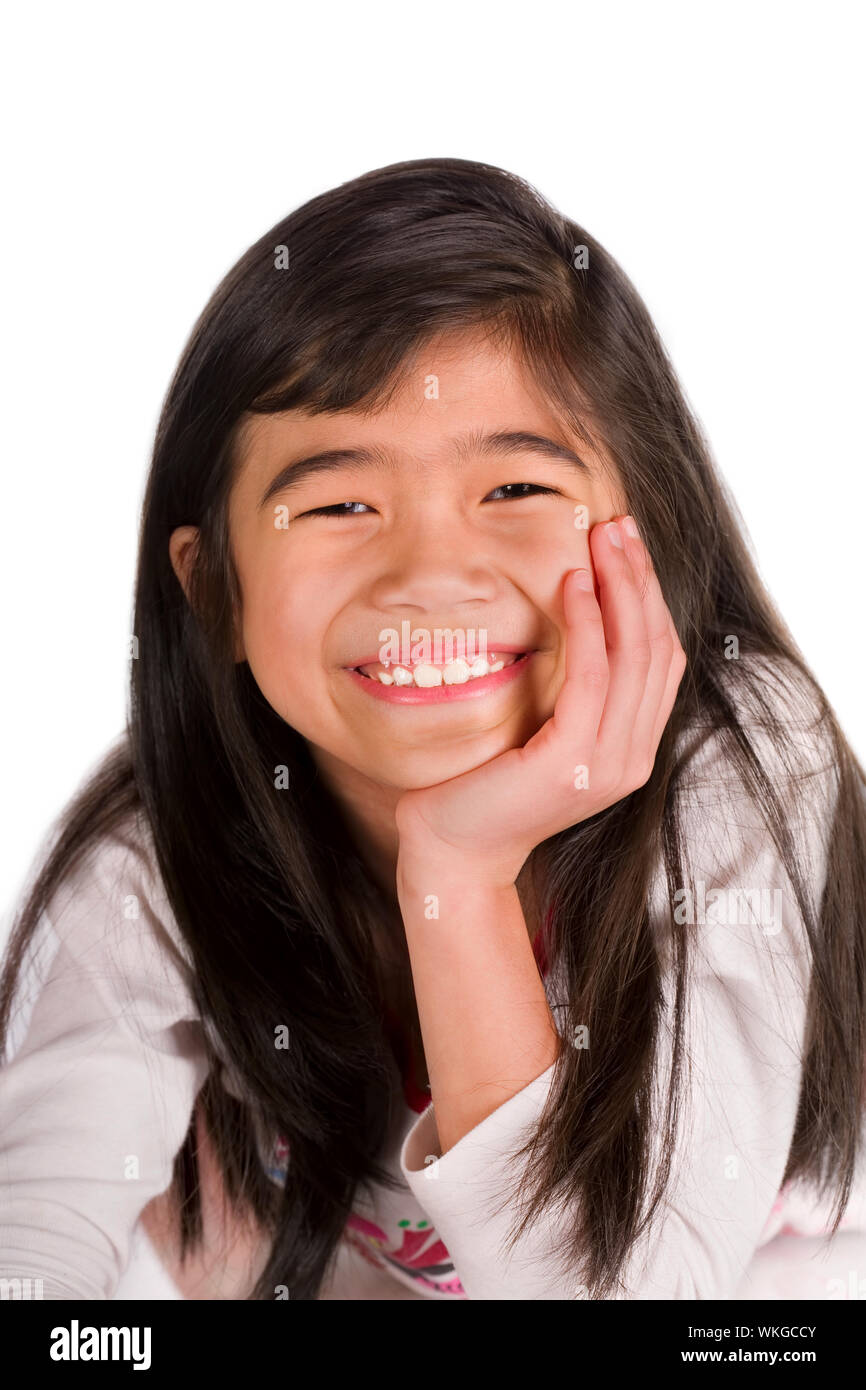 Girl chin on hand smiling Stock Photo - Alamy