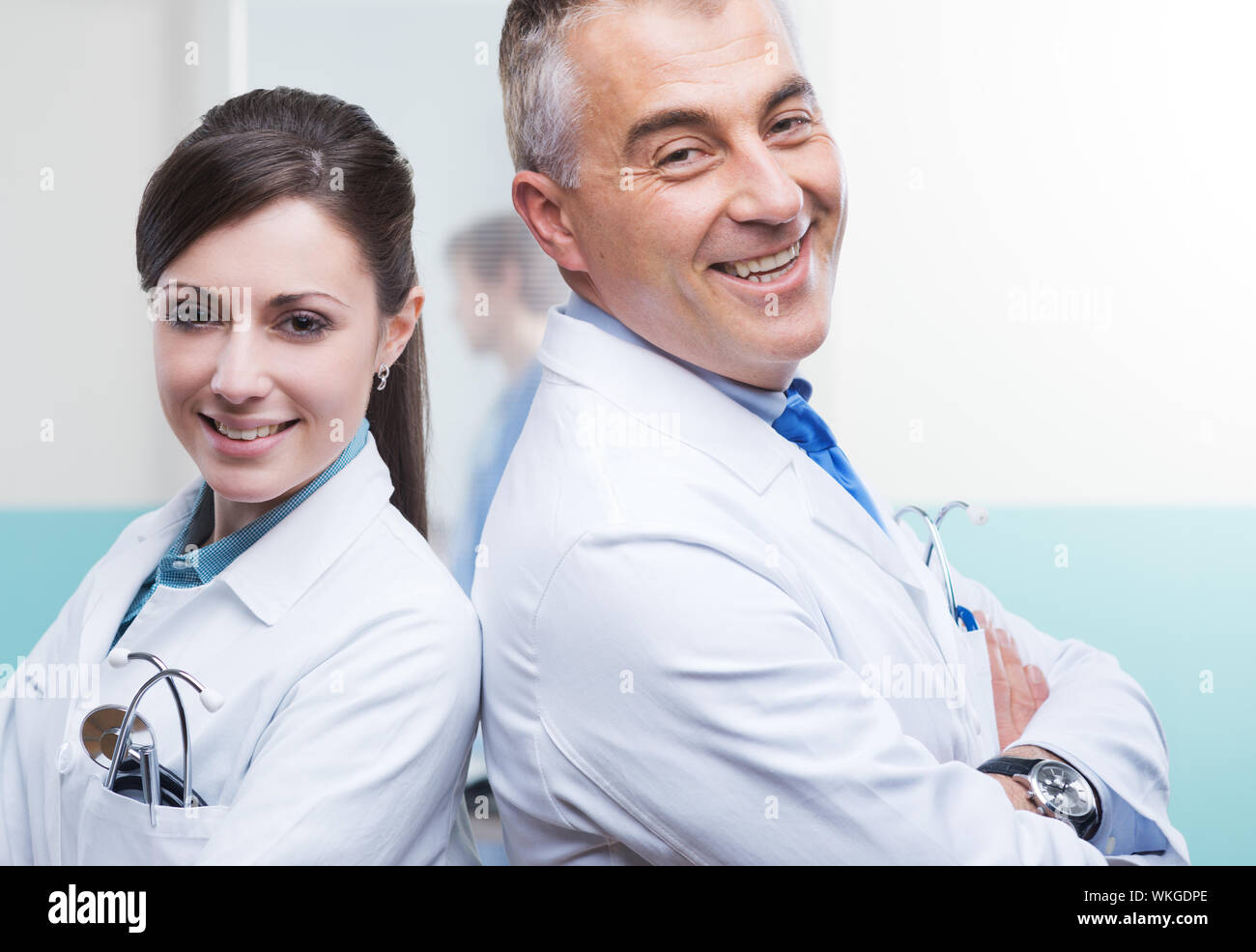 Medical team back smiling hi-res stock photography and images - Alamy