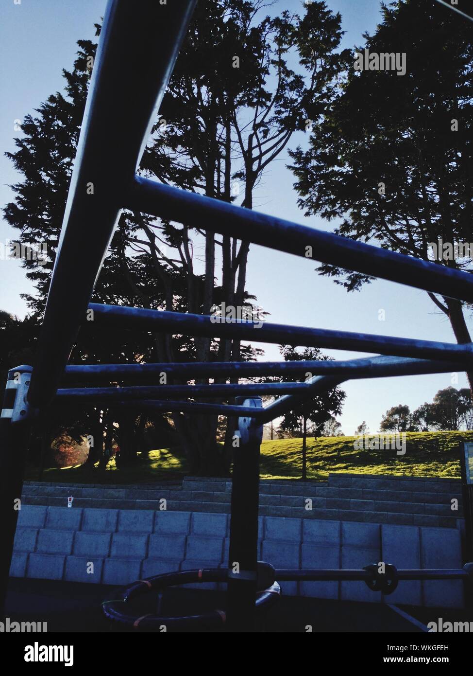 Man monkey bars playground hi-res stock photography and images - Alamy