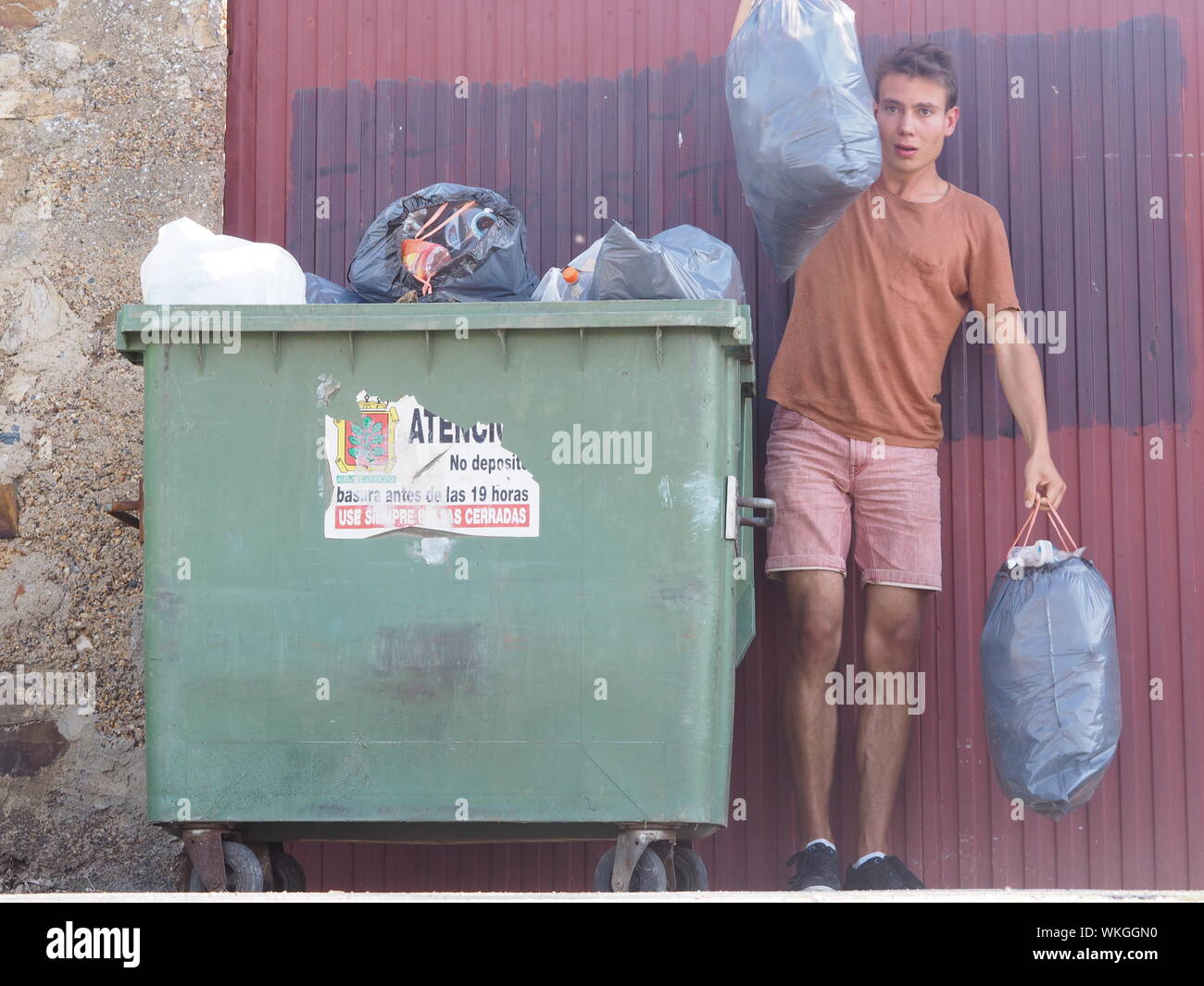 Garbage holding hi-res stock photography and images - Alamy