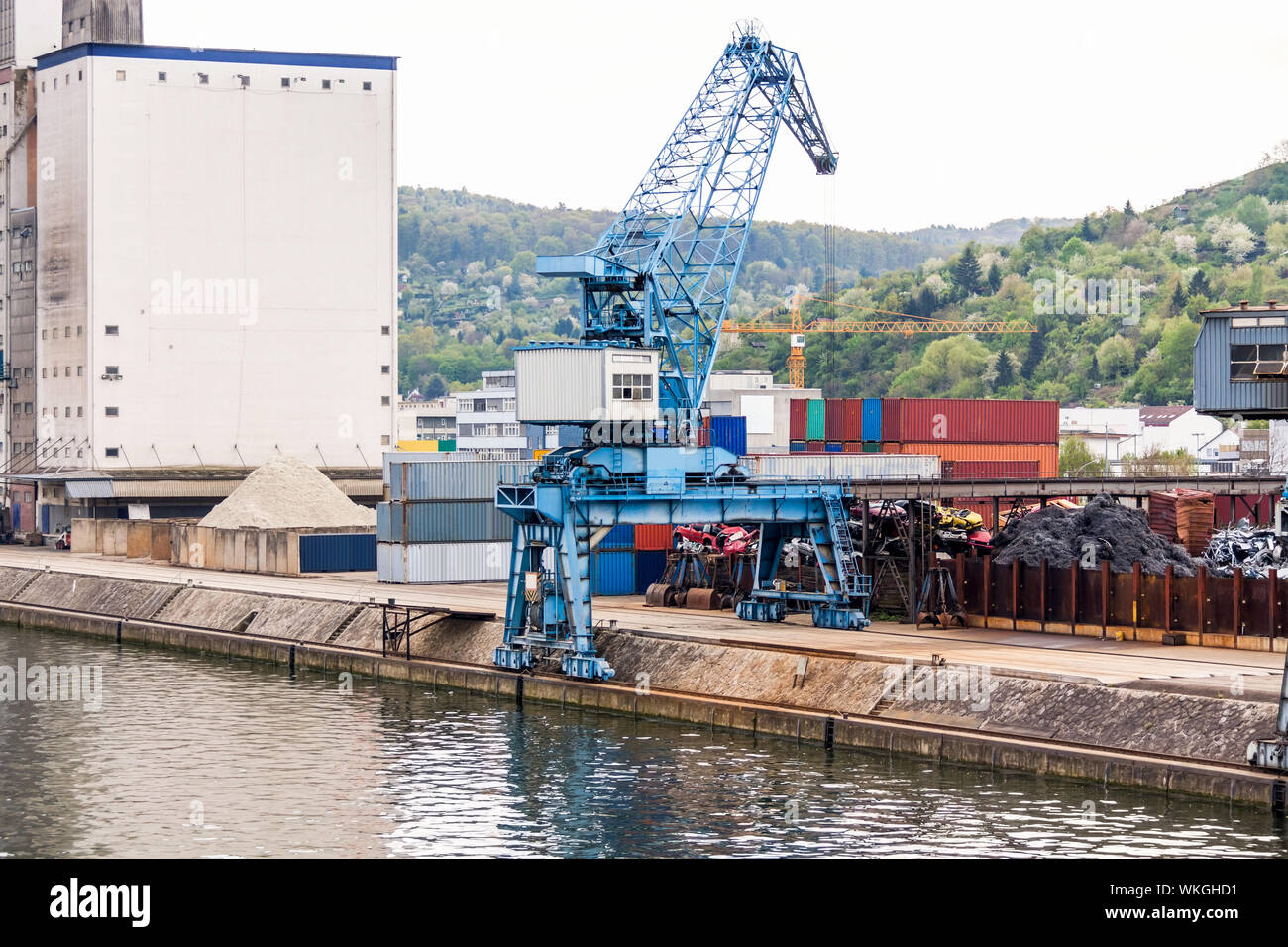 Shipyard with stacked cargo containers and cranes Stock Photo - Alamy