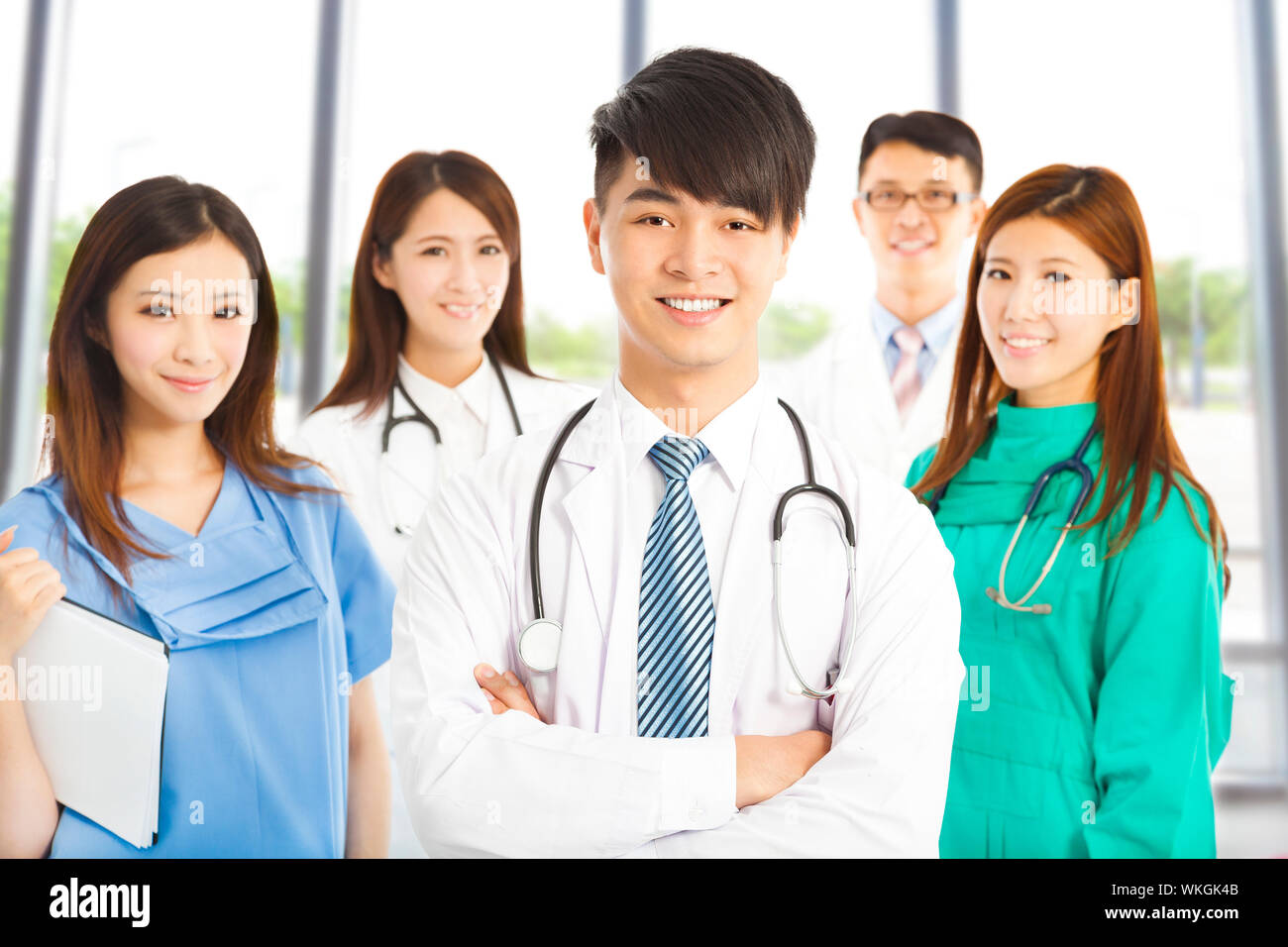 Professional medical doctor team standing over white background Stock ...