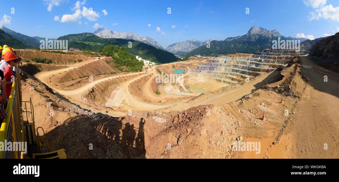 Eisenerz: mountain Erzberg of iron ore mine, visitors at Hauly trip on ...