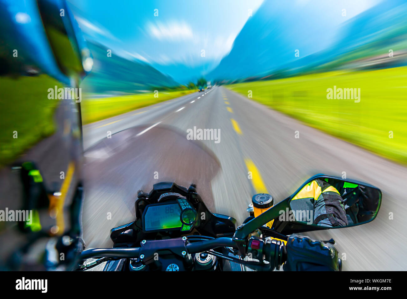 Slow motion of motorbike riding on the mountainous highway, extreme ...