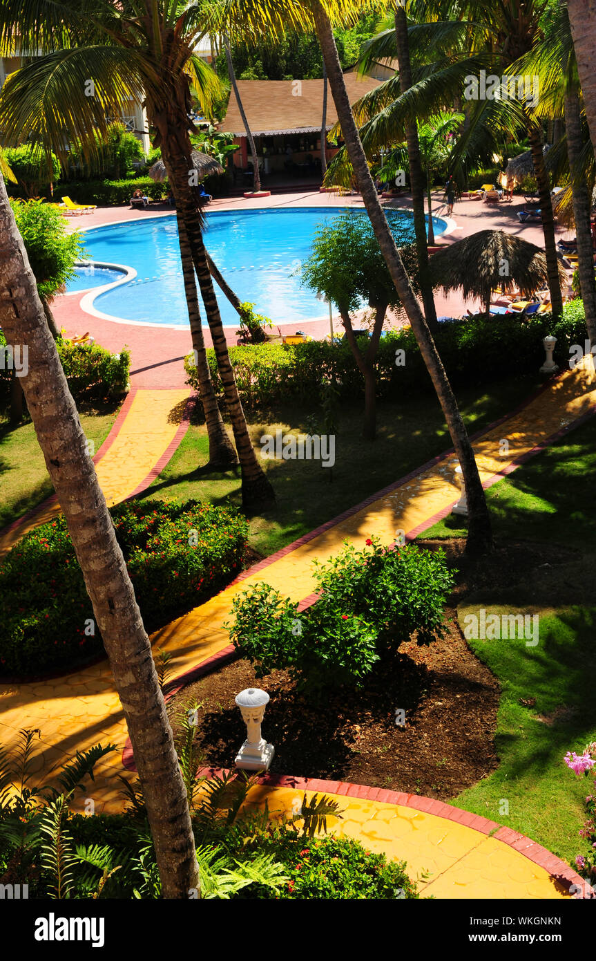 Swimming pool and garden landscaping at tropical resort Stock Photo - Alamy