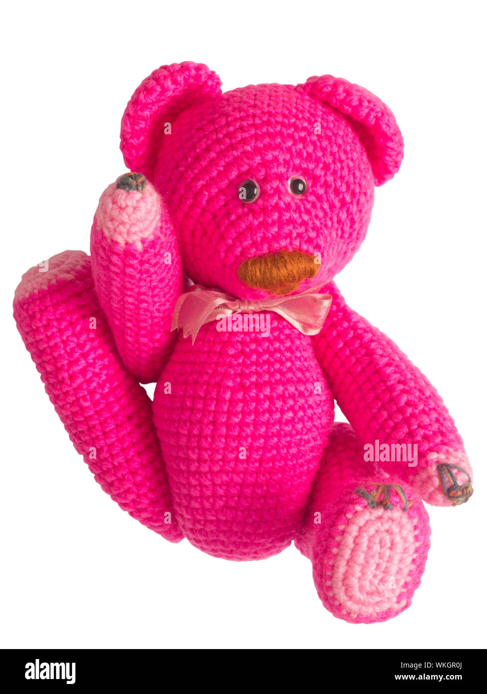close up of a twisted neon pink teddy bear isolated Stock Photo - Alamy