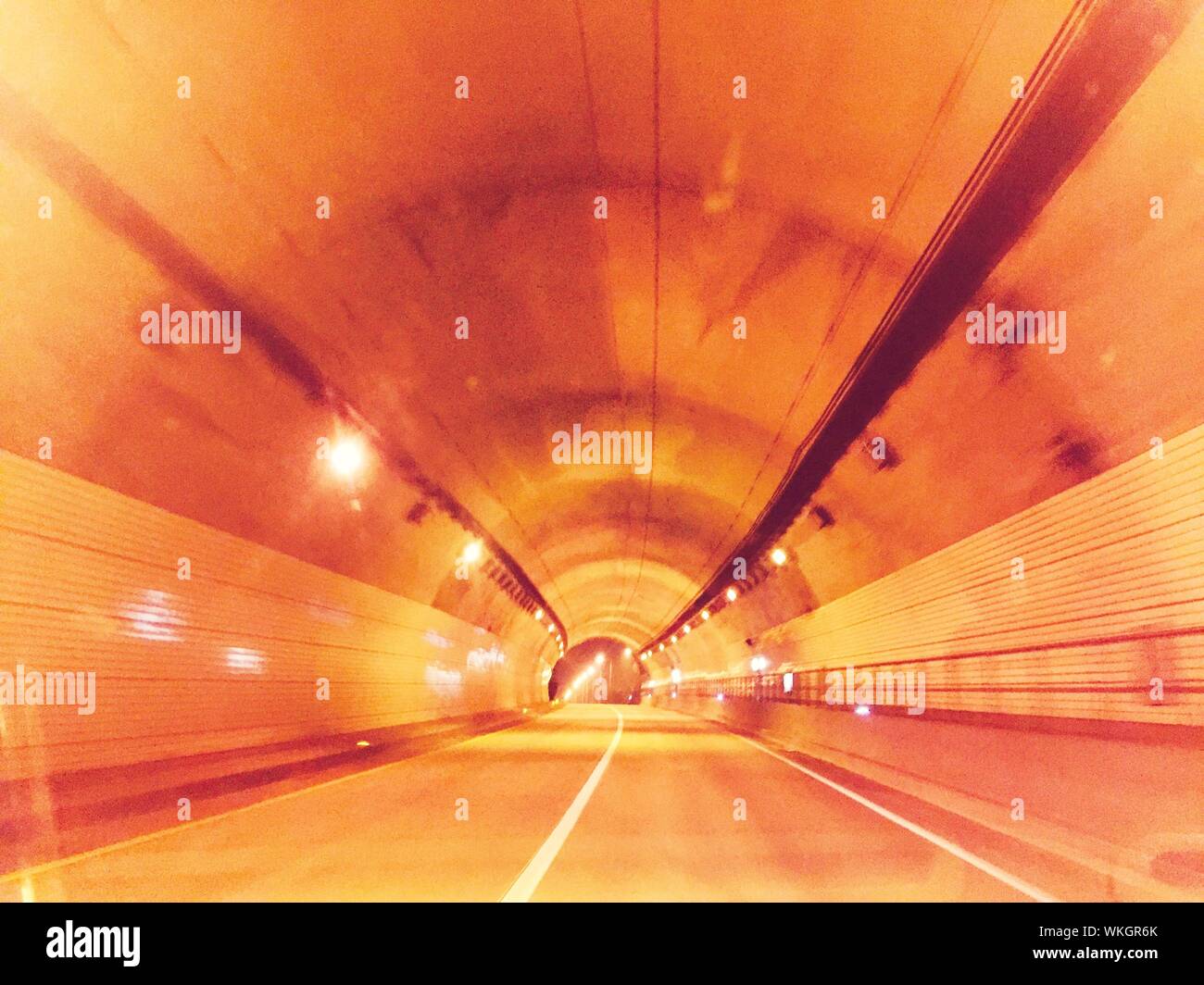Interior Of Orange Tunnel Stock Photo - Alamy