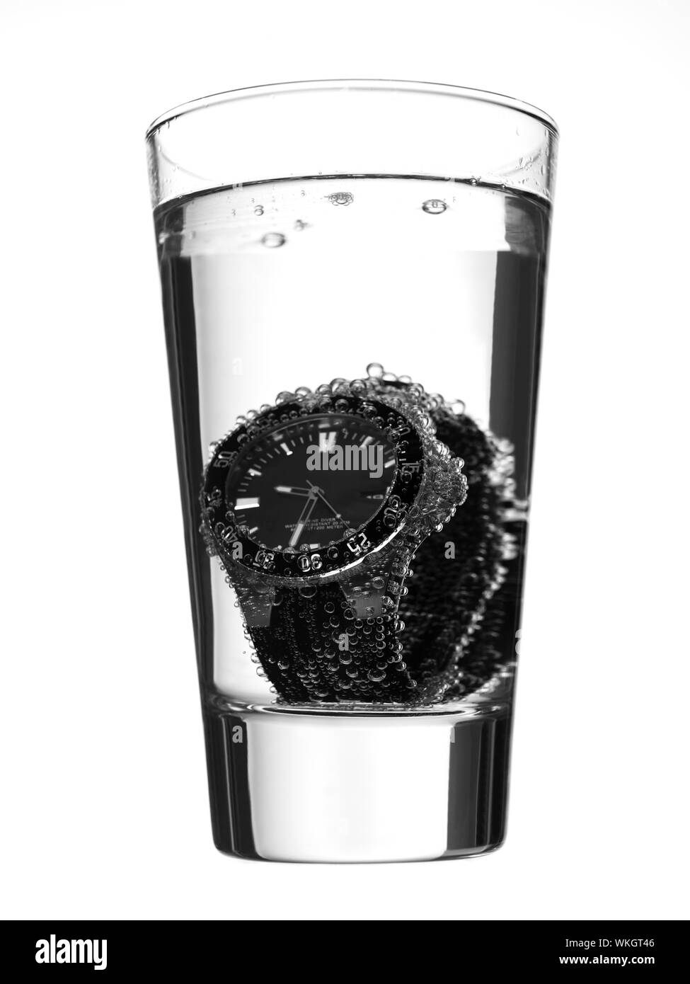 a glass with a clock inside Stock Photo - Alamy