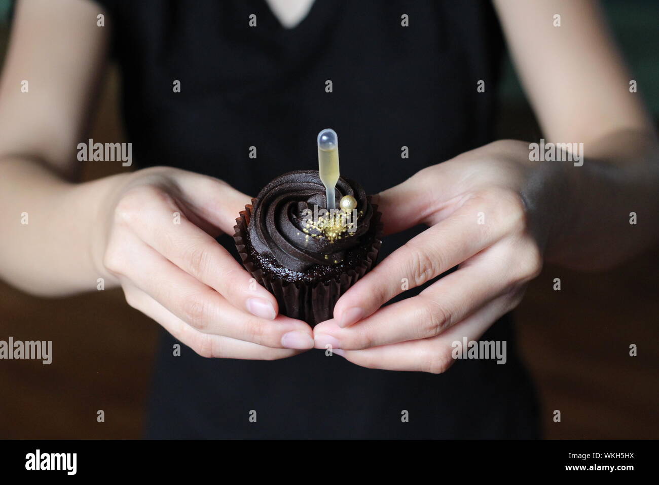 Woman holding cake hands hi-res stock photography and images - Alamy