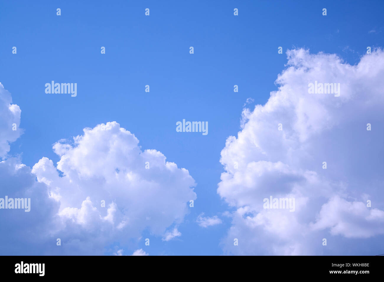 White clouds high in the sky at windy winter day background Stock Photo ...
