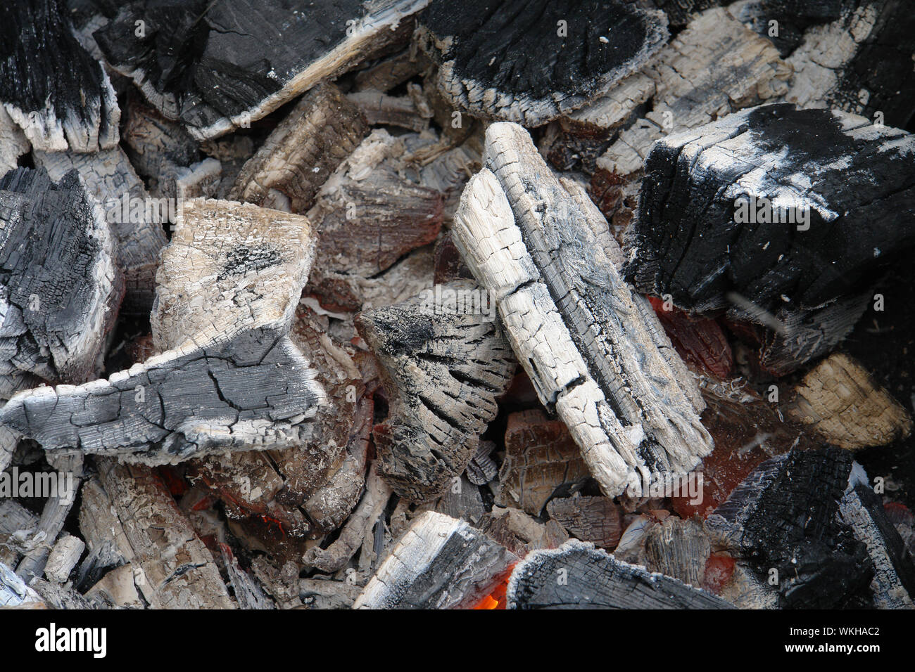 Fire ash and ember in fire place Stock Photo - Alamy