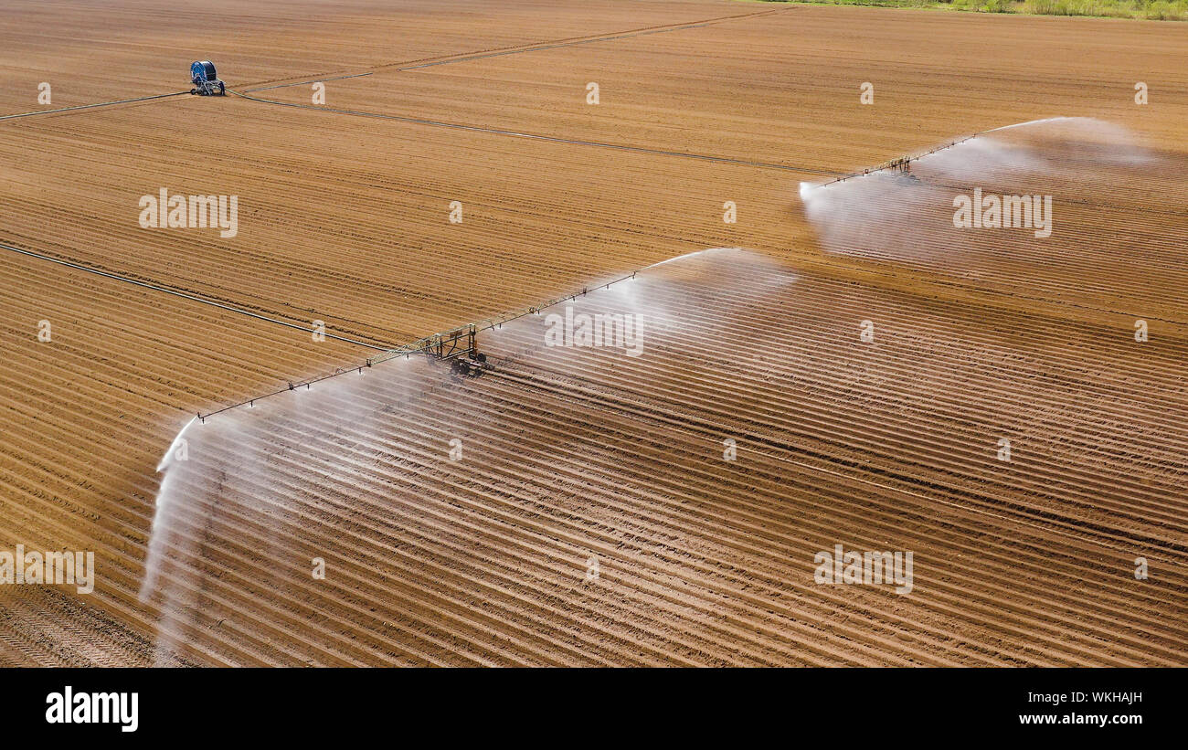 aerial view crop irrigation machine using center pivot sprinkler system ...