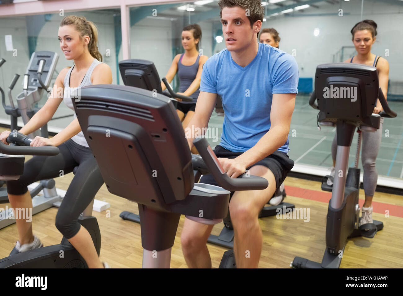 Man riding cycle in gym hi-res stock photography and images - Alamy