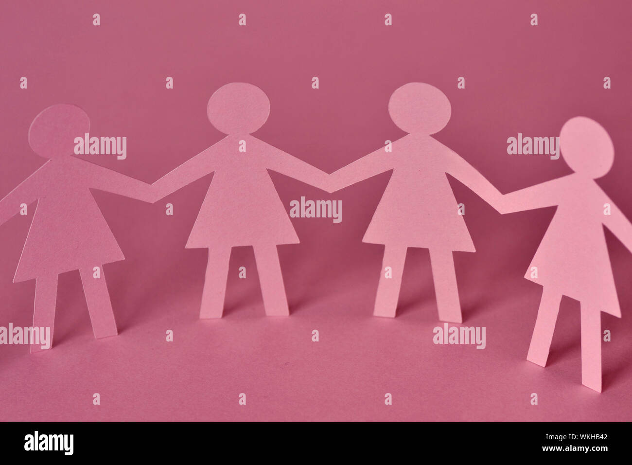 Cut out paper people chain hi-res stock photography and images - Alamy