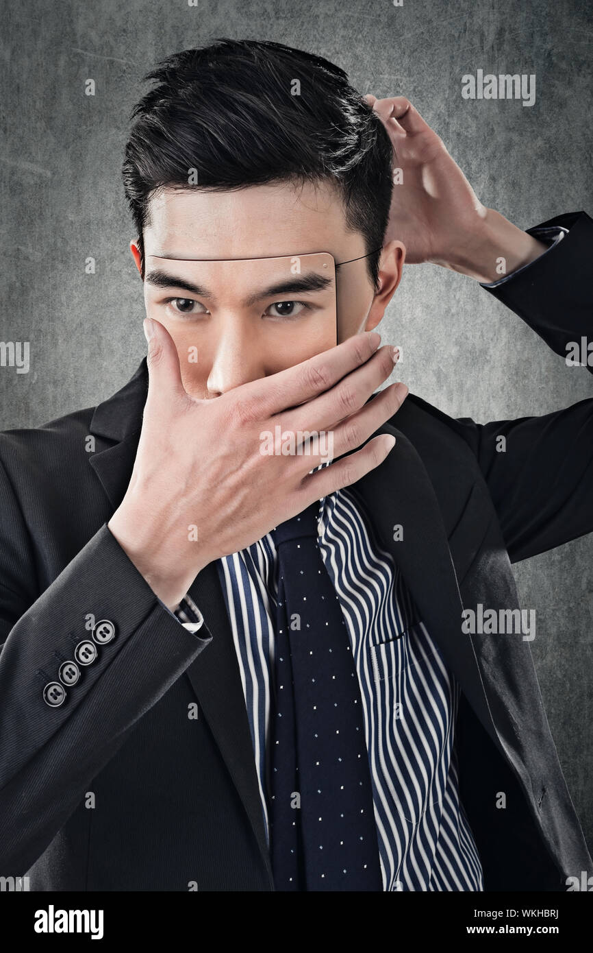 Asian business man in mask, concept of hide, cheat, lie etc Stock Photo ...