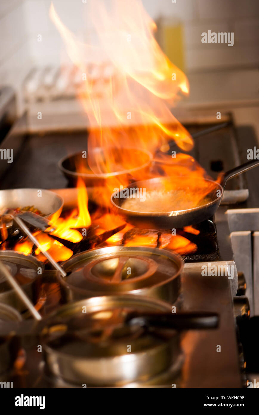 Man frying on a gas stove hi-res stock photography and images - Alamy