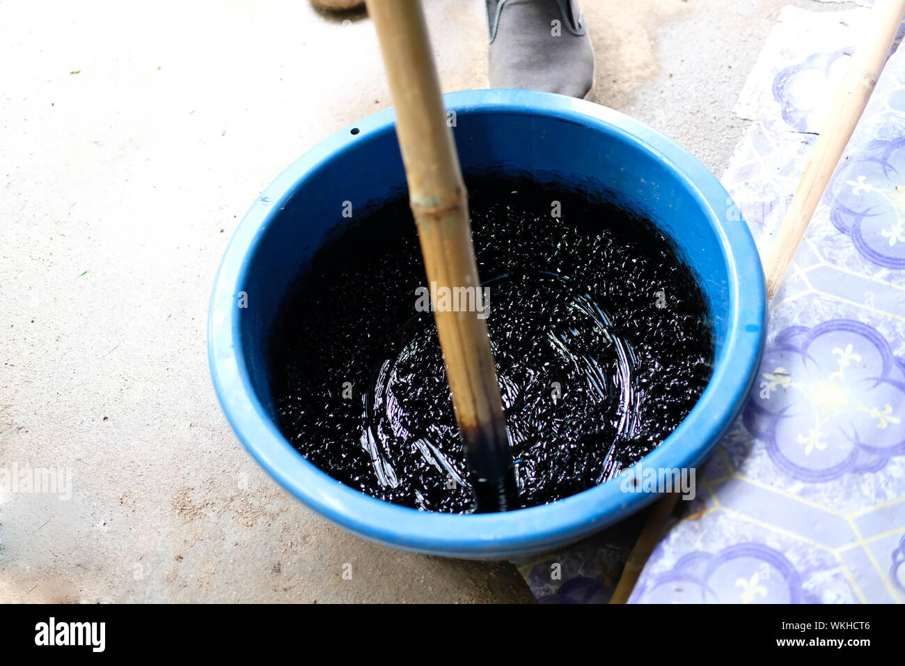 plant seed stirring in sulfuric acid for peeling husk shell Stock Photo ...