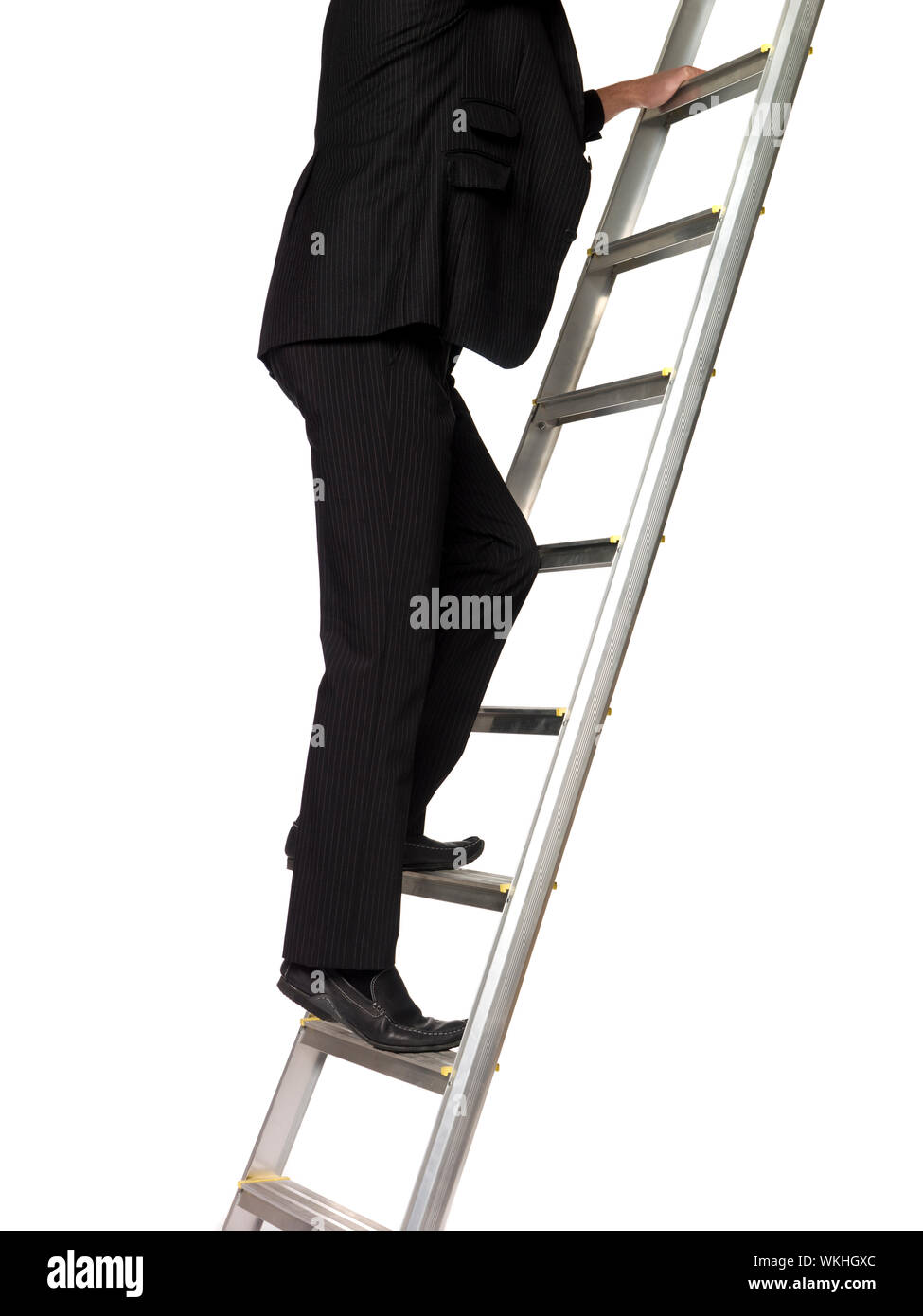 Man climbing a ladder Stock Photo - Alamy
