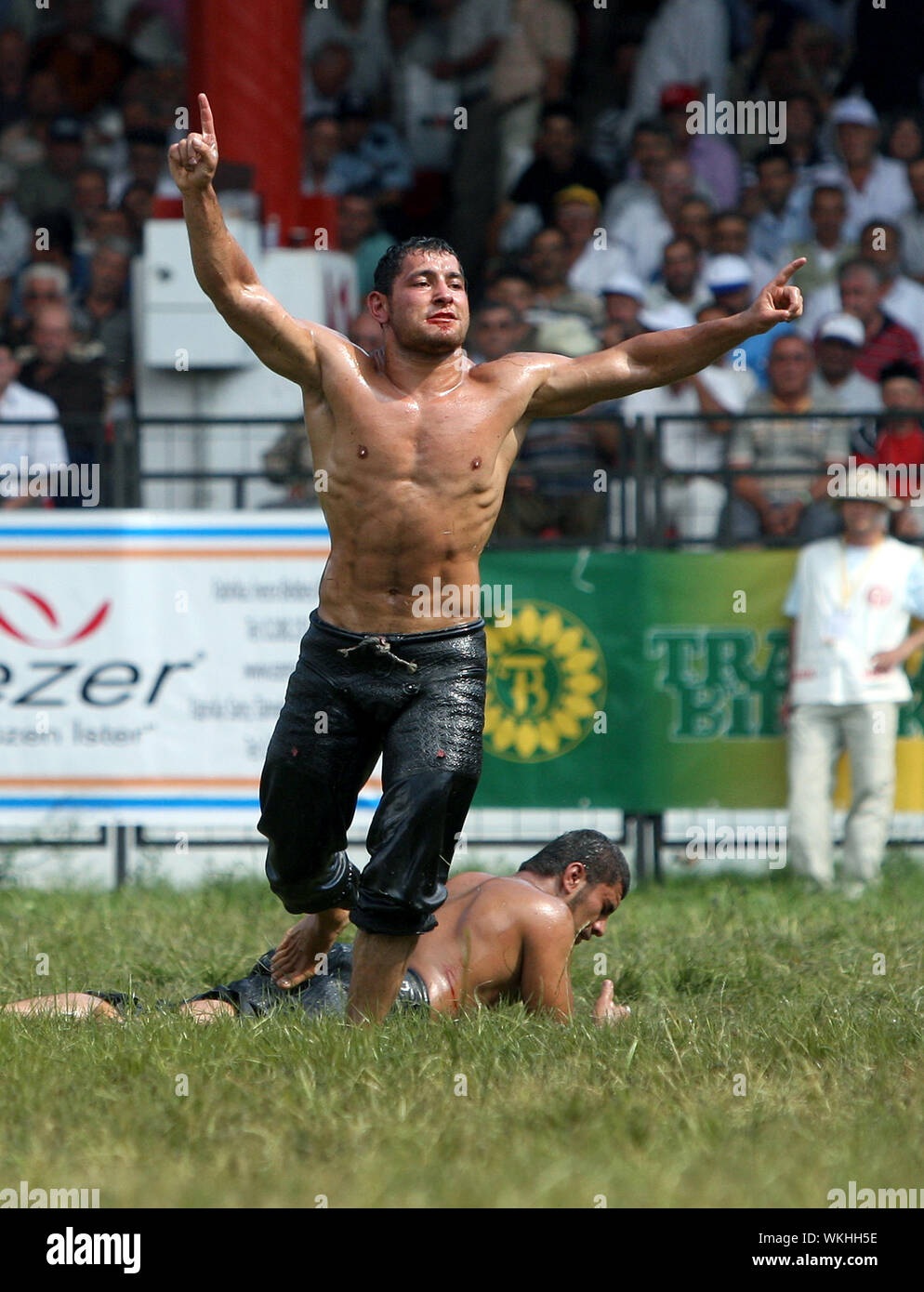 A wrestler celebrates victory on the final day of competition at the ...