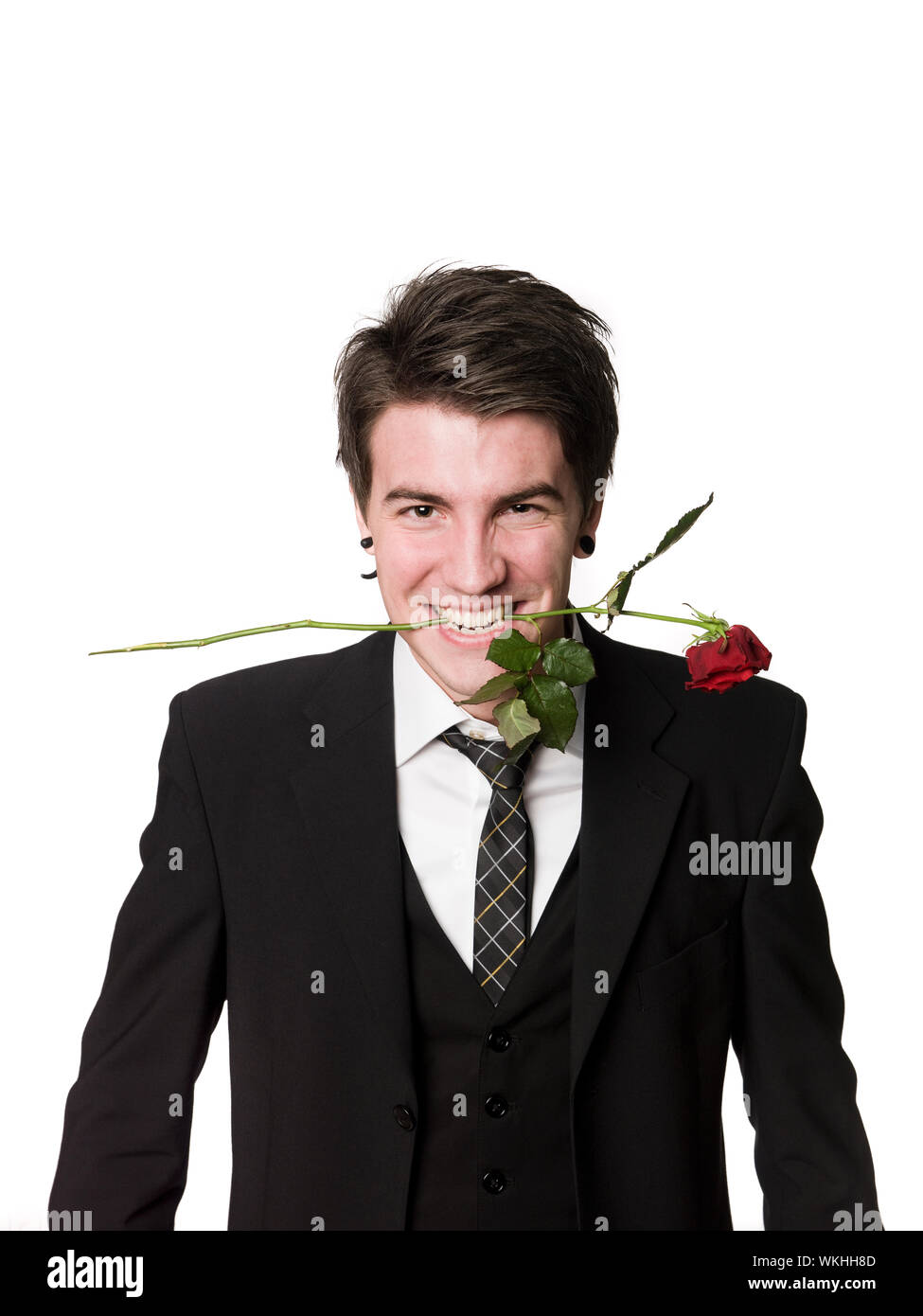 Man with a rose in his mouth Stock Photo - Alamy