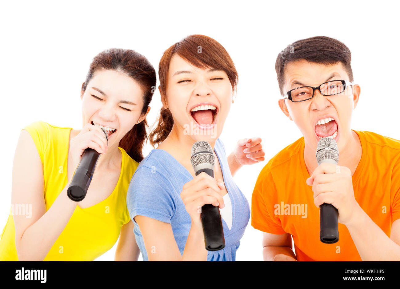 happy young group having fun singing with karaoke Stock Photo - Alamy