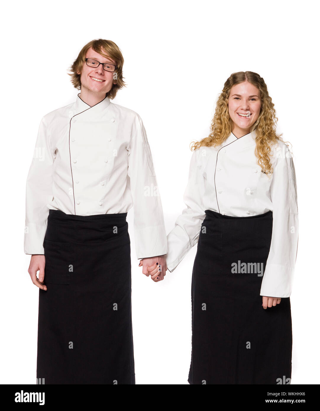 Waiter and a waitress holding hands Stock Photo - Alamy