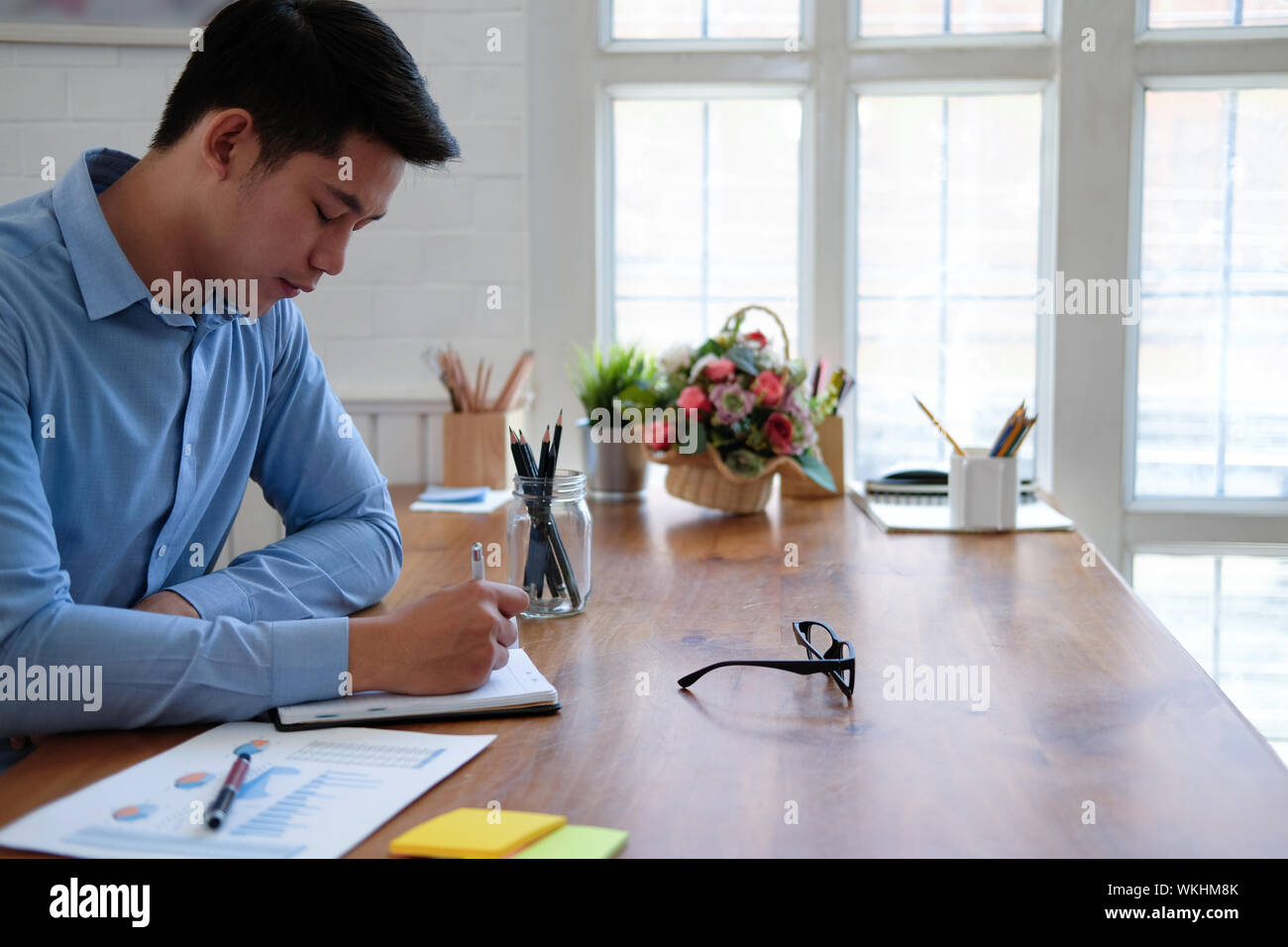 man working with document. businessman writing organizing plan at ...