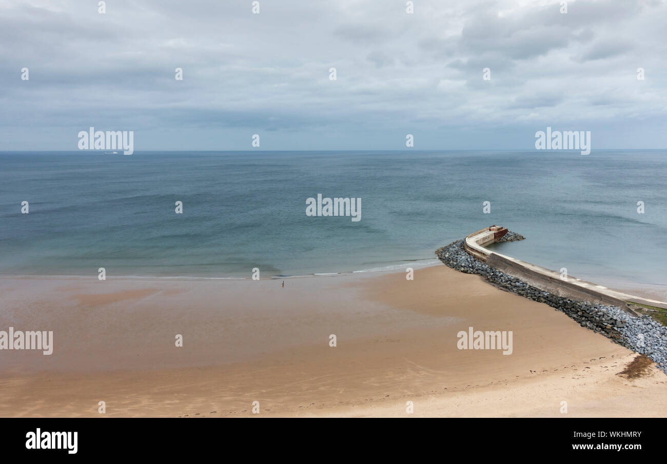 View from The Cleveland Way coastal trail overlooking Cattersty Sands ...