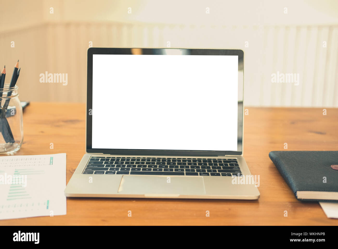 computer notebook on desk table at workplace office Stock Photo - Alamy