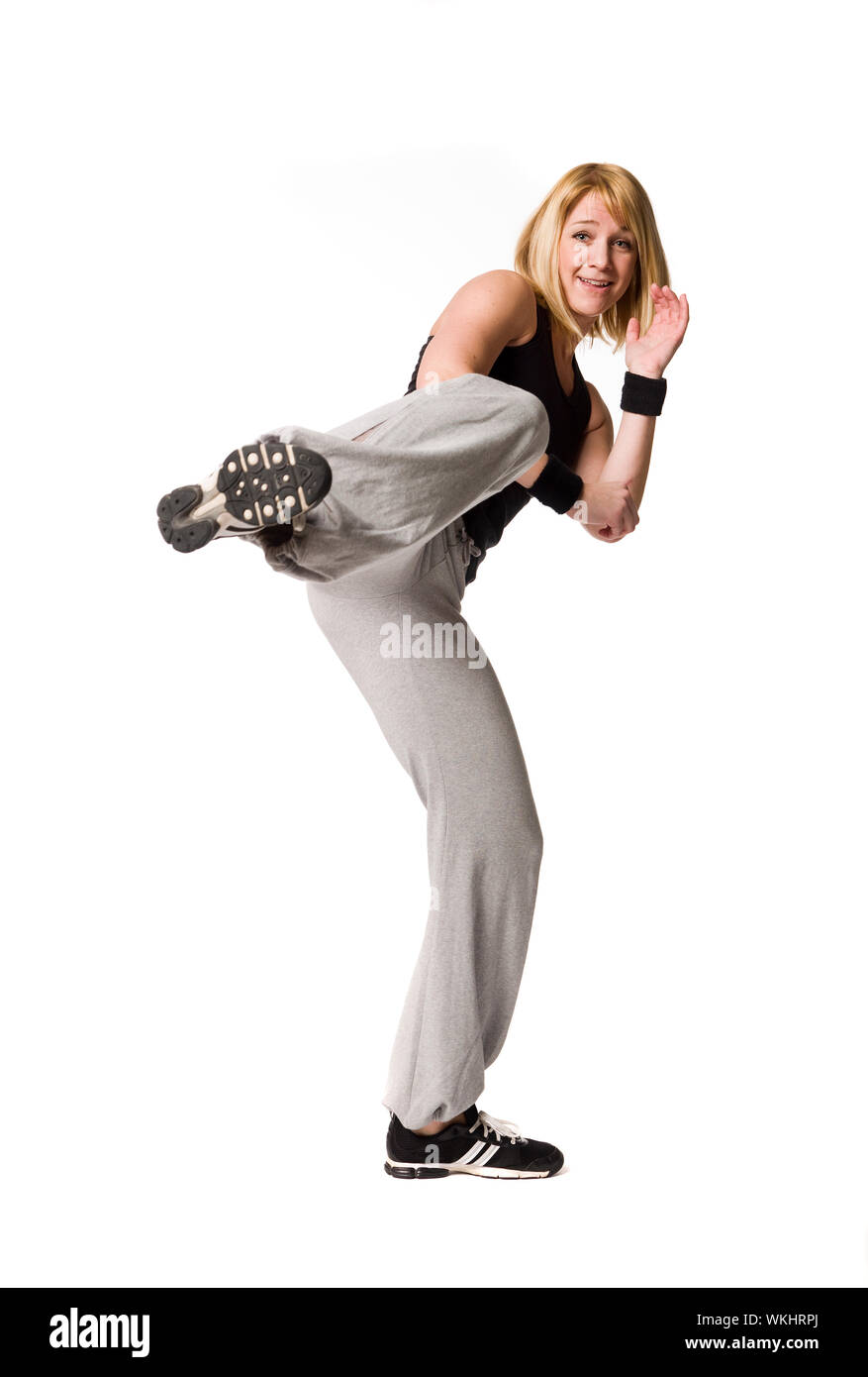 Girl doing a kick Stock Photo - Alamy
