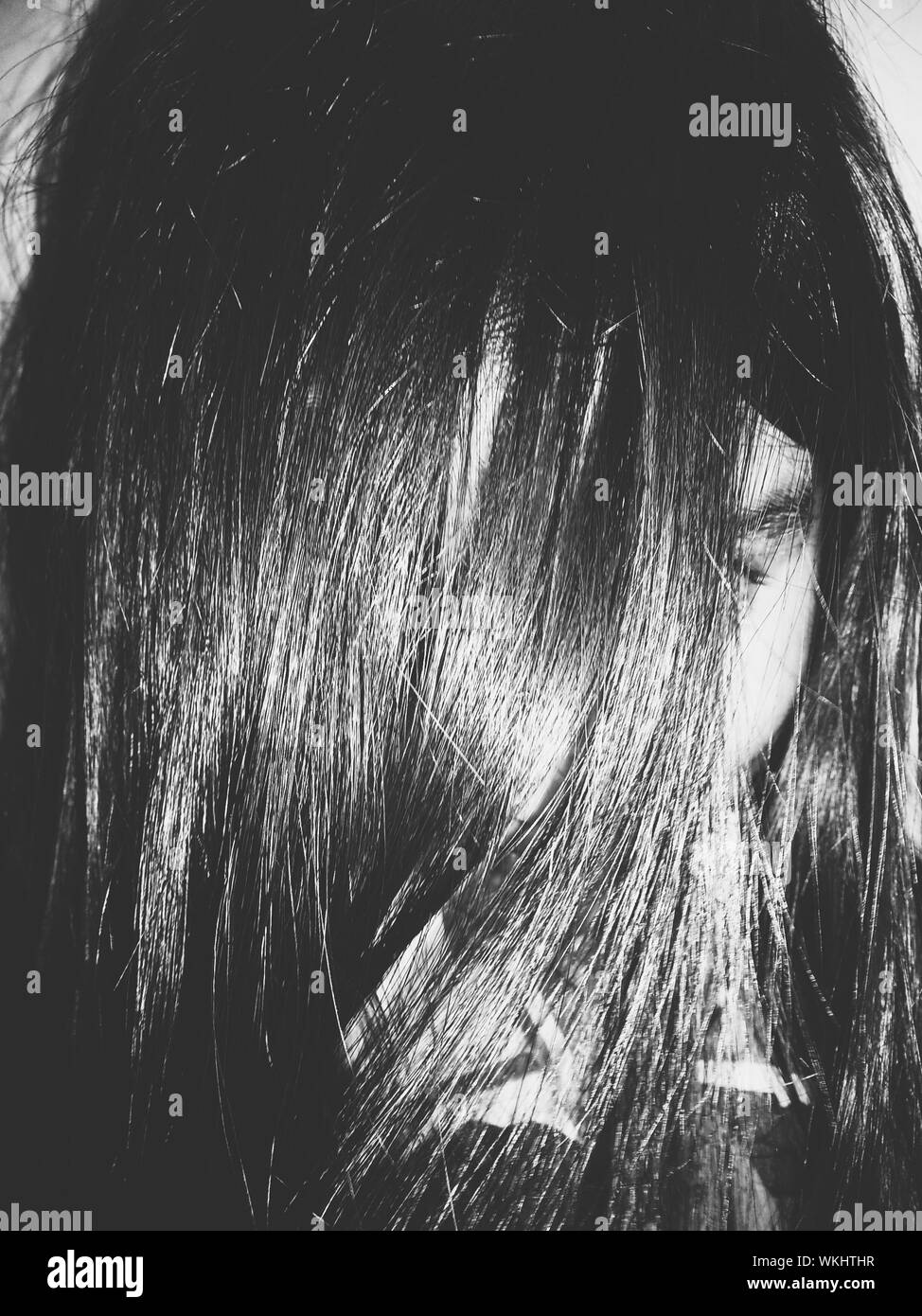 Woman hair covering face hi-res stock photography and images - Alamy