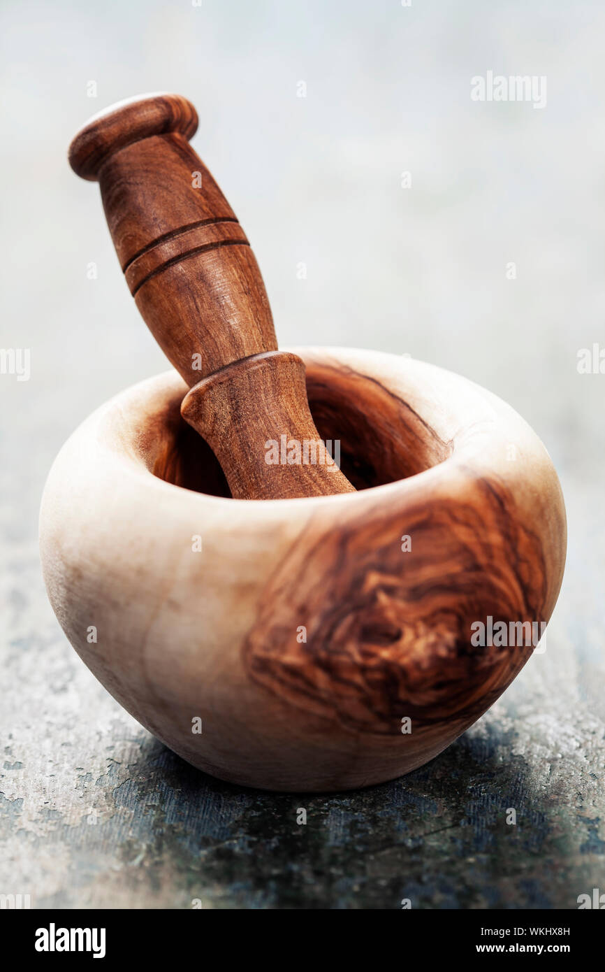 Wooden Mortar and Pestle - cooking concept Stock Photo - Alamy