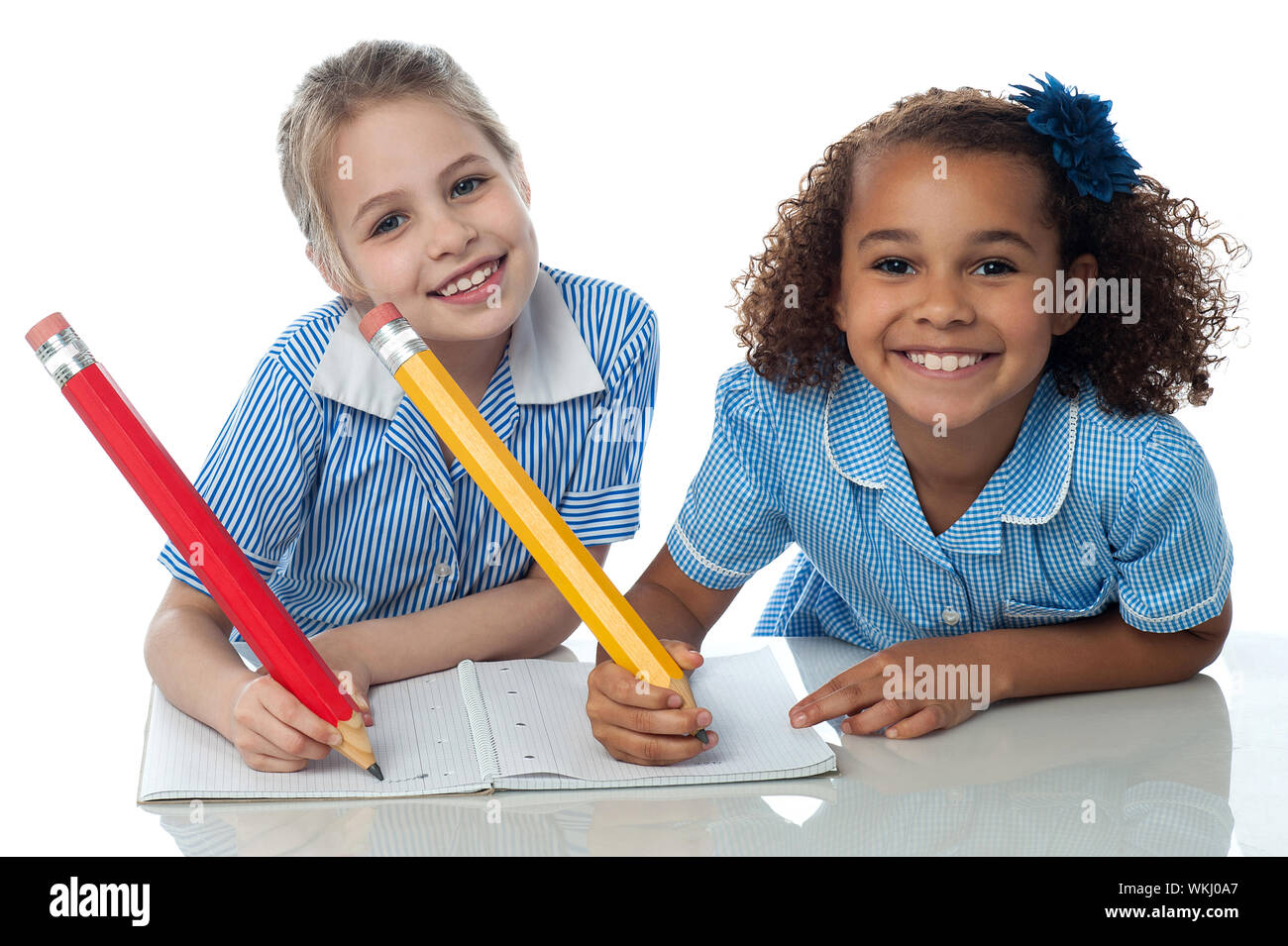 Elementary school student doing assignment hi-res stock photography and ...