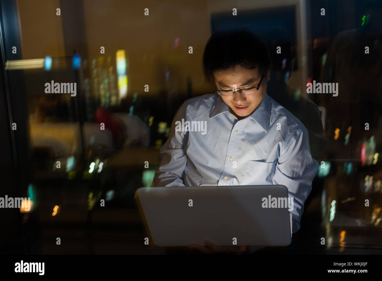 Night office young japanese hi-res stock photography and images - Alamy