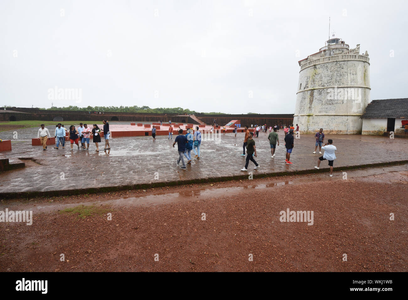 Tourists are walking at the Upper Aguada Fort. Bardez, North Goa, India ...