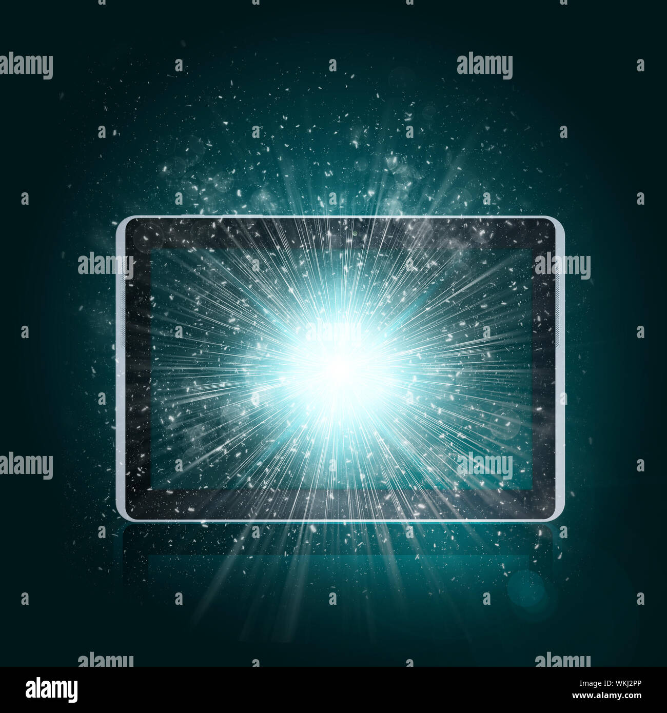 Tablet pc with magic light and falling stars. Dark background Stock ...